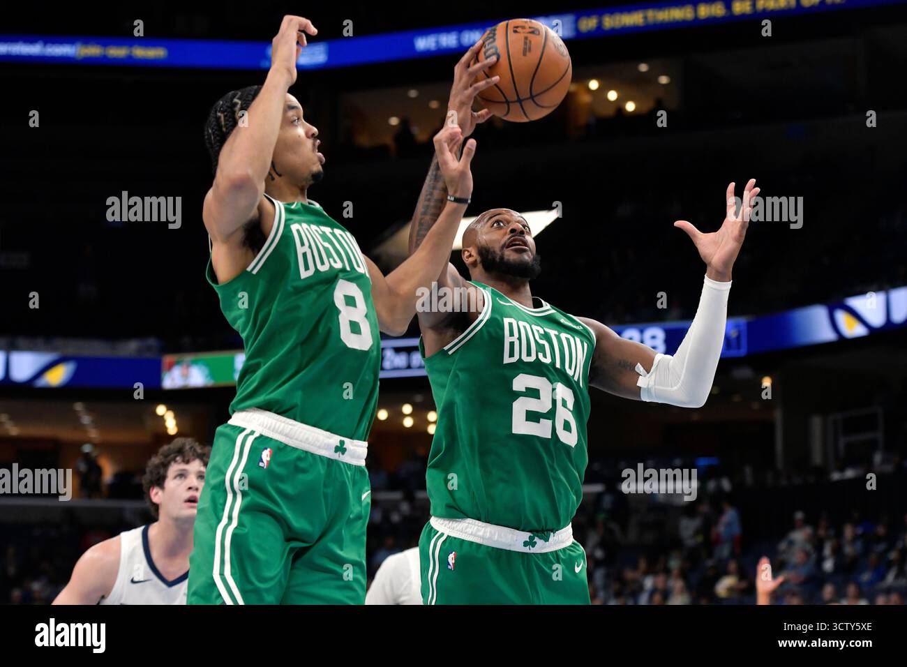Boston Celtics forwards Xavier Tillman Sr. (26) and Josh Minott (8 ...