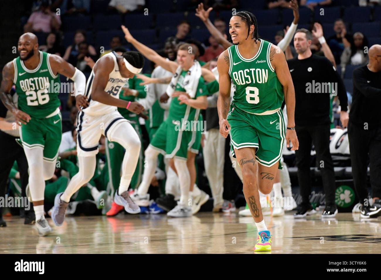 Boston Celtics forward Josh Minott (8) reacts in the first half of an ...