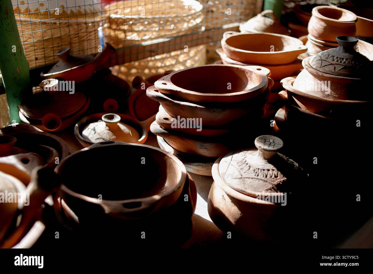 traditional market with goods made from rattan, bamboo and palm leaves ...