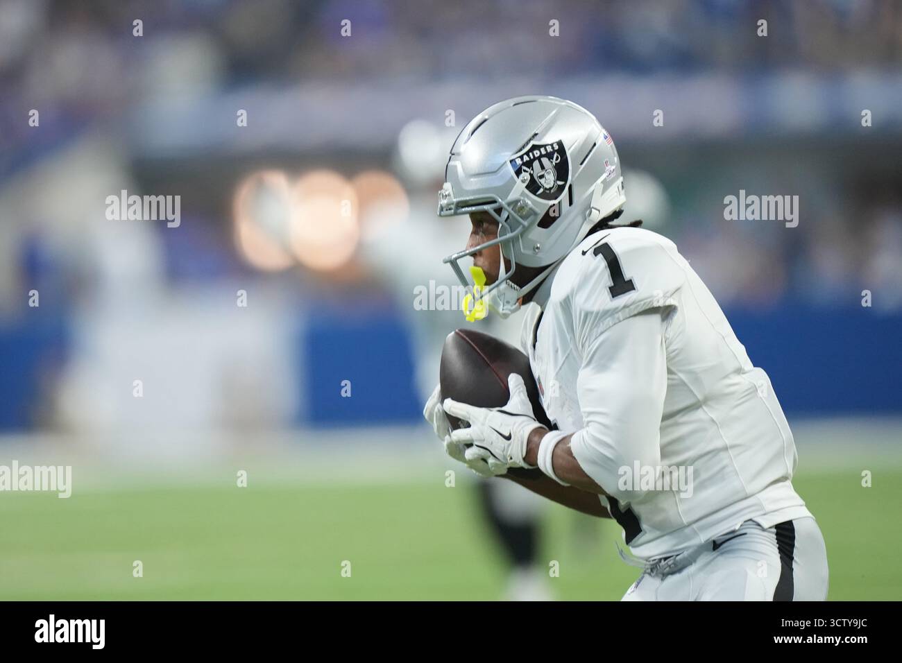 Las Vegas Raiders wide receiver Tre Tucker runs during the first half ...