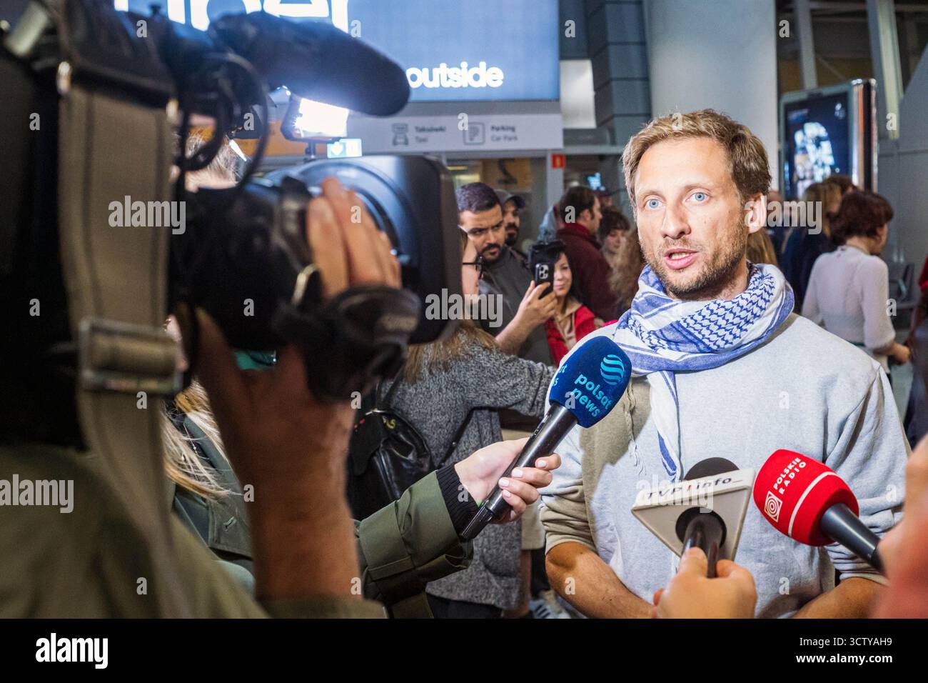 Polish member of Parliament Franek Sterczewski is interviewed by the ...