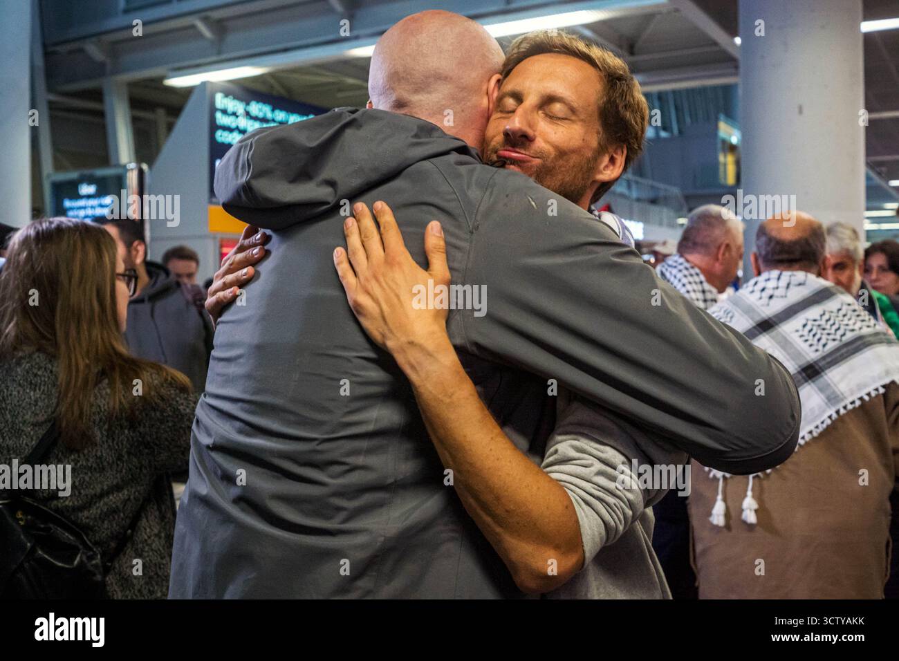 Polish member of Parliament Franek Sterczewski is greeted by a friend ...