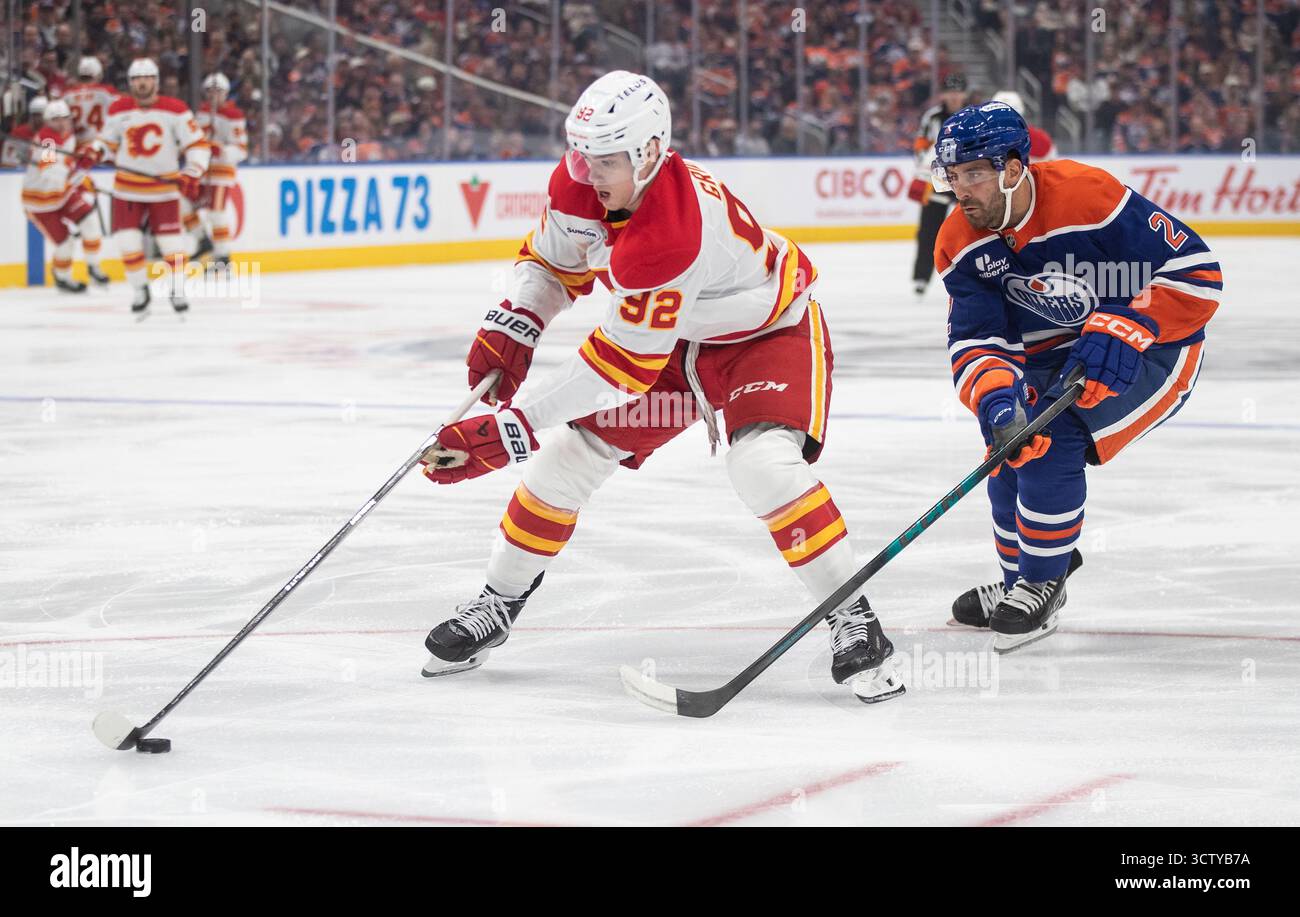 Calgary Flames' Matvei Gridin (92) is chased by Edmonton Oilers' Evan ...