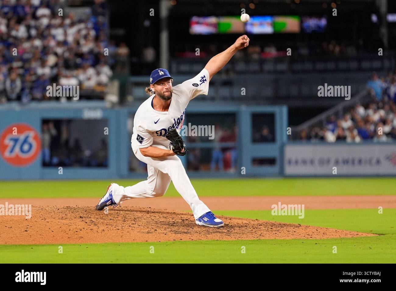 Los Angeles Dodgers relief pitcher Clayton Kershaw throws to a ...