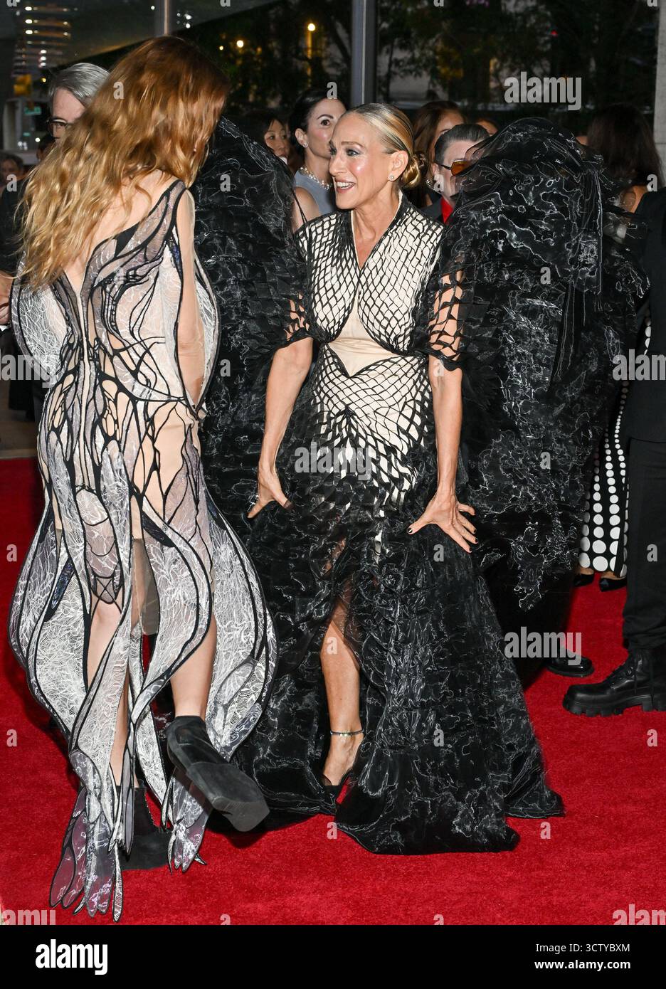 Sarah Jessica Parker, right, chats with gala fashion designer Iris van Herpen at the New York ...