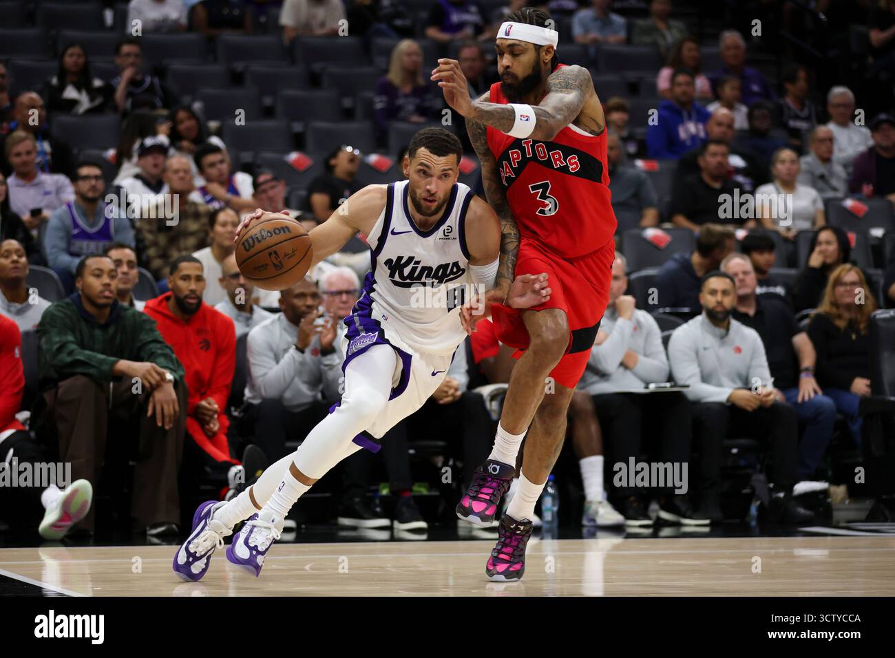 Sacramento Kings guard Zach LaVine (8) dribbles by Toronto Raptors ...