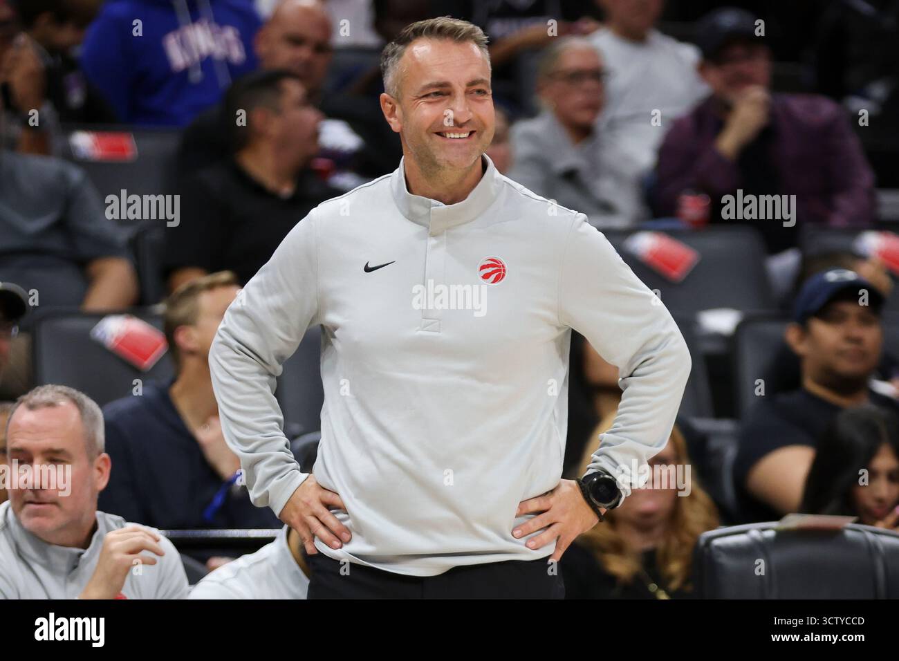 Toronto Raptors head coach Darko Rajakovic smiles during the first half ...