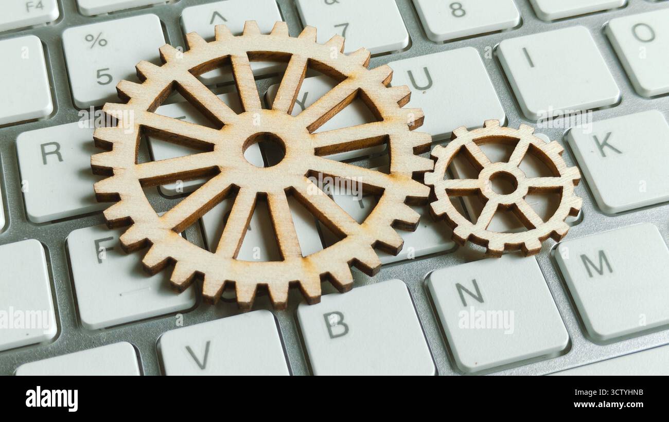 System wooden cogwheels on hi-res stock photography and images - Alamy