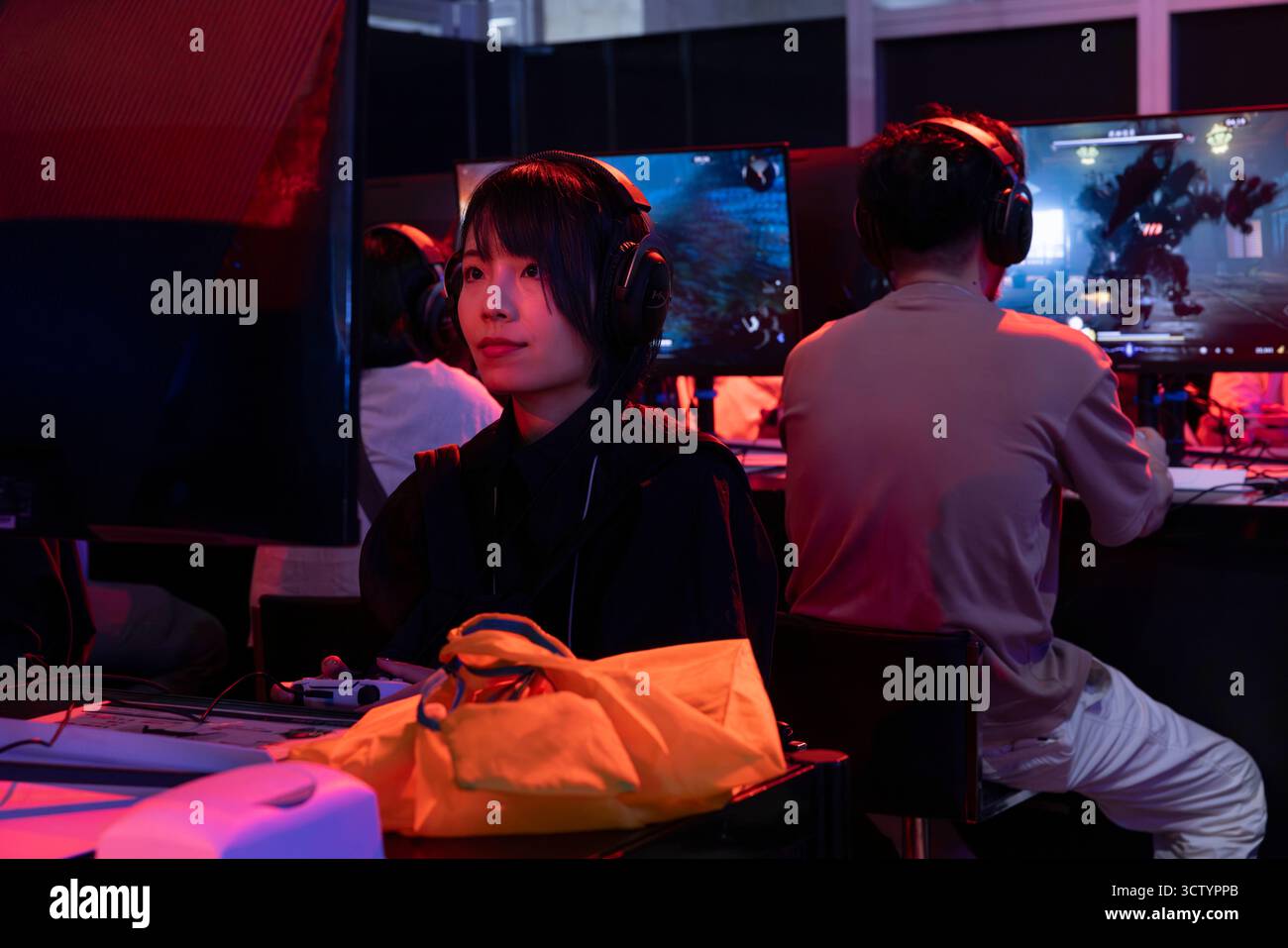 Visitors play Nioh 3 video game at the Tokyo Game Show 2025. Nioh 3 is an upcoming action role ...