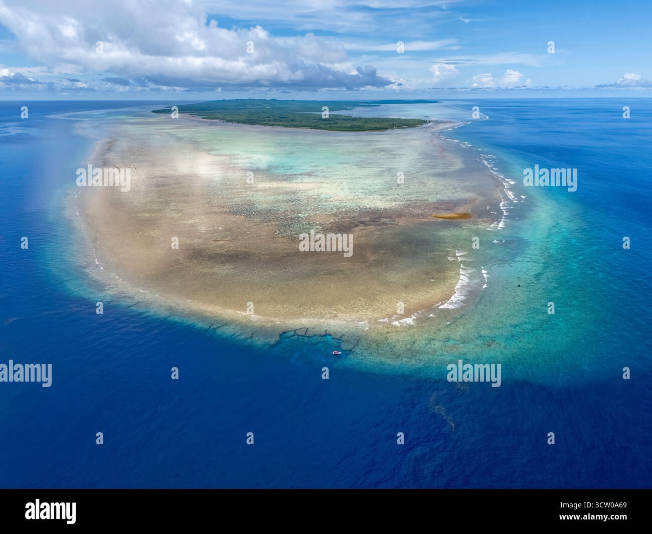 An aerial view of the southern end of the reef surrounding the island ...
