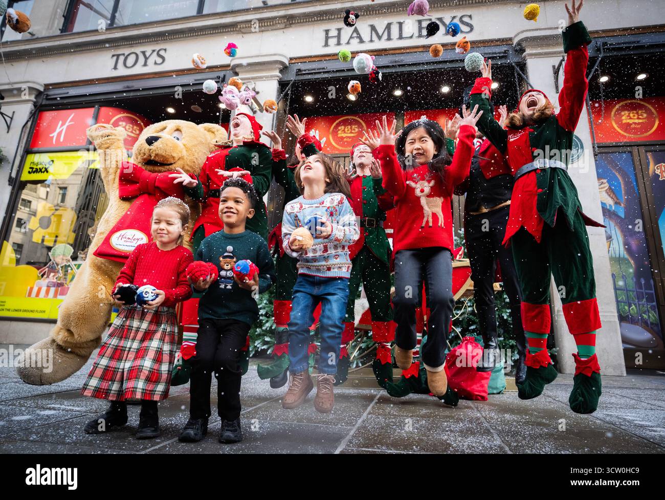 Children throw TY Bouncers outside Hamleys in London during the ...