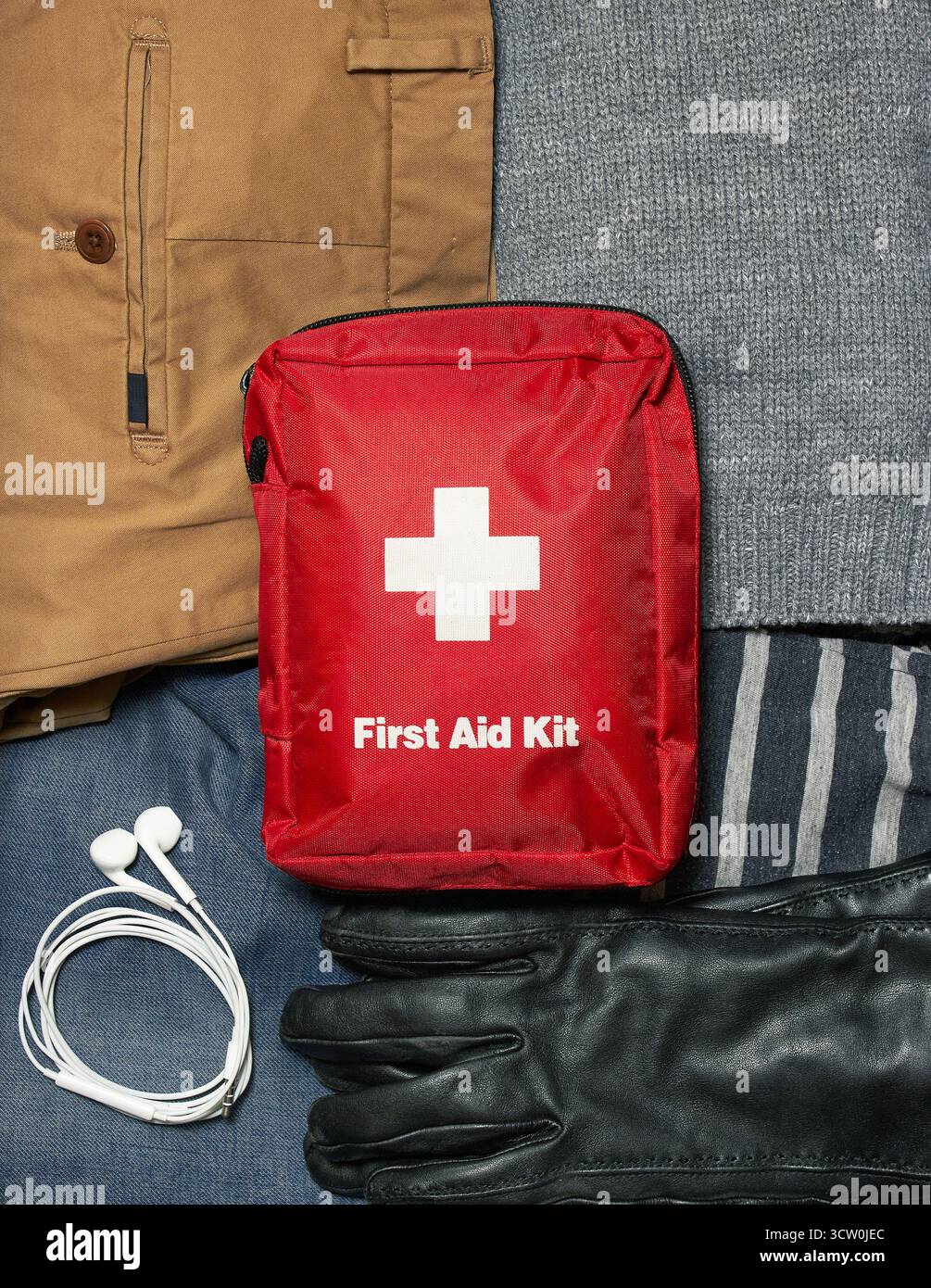 First Aid Kit in suitcase with clothes Stock Photo - Alamy