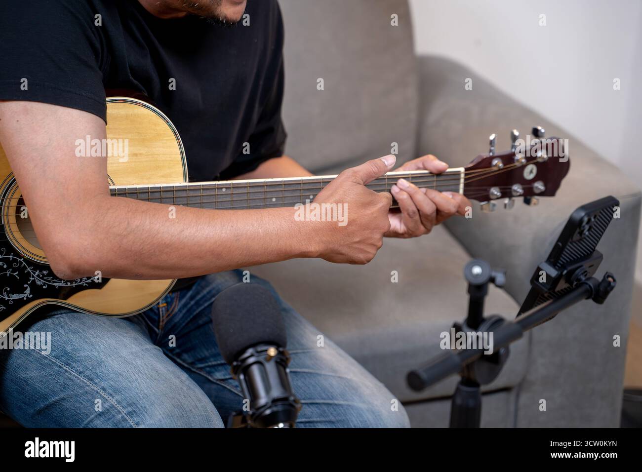 Beautiful young musician practicing recorder hi-res stock photography ...