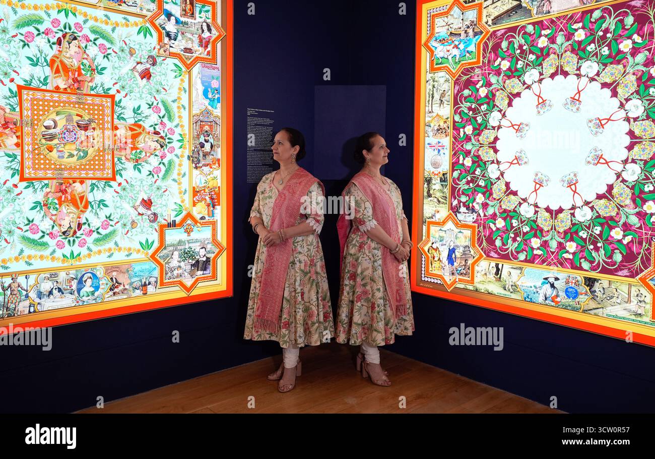 EDITORIAL USE ONLY The Singh Twins look at their light box art works ...