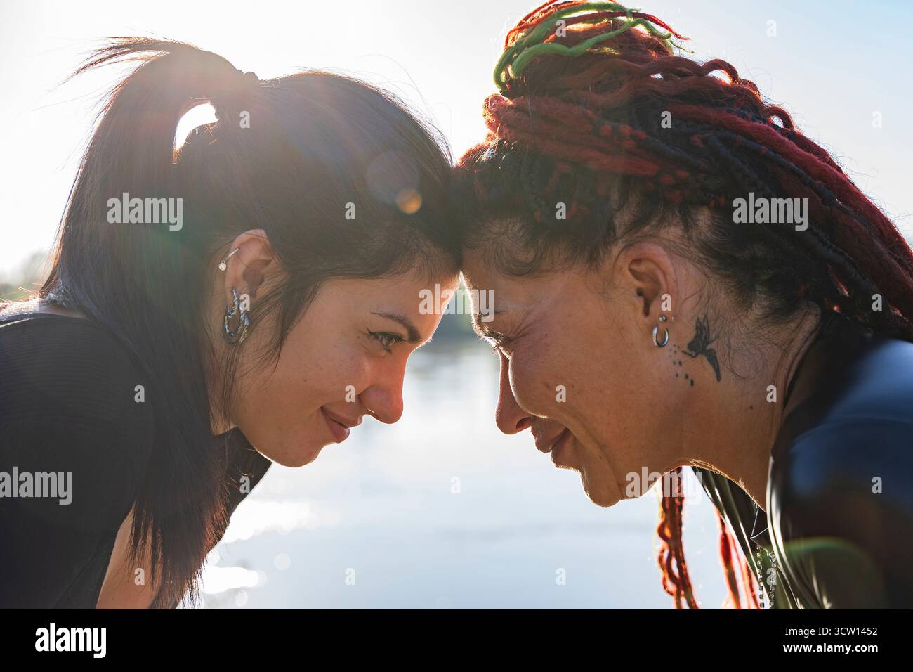 Adult women showing affection and connection, expressing love and ...