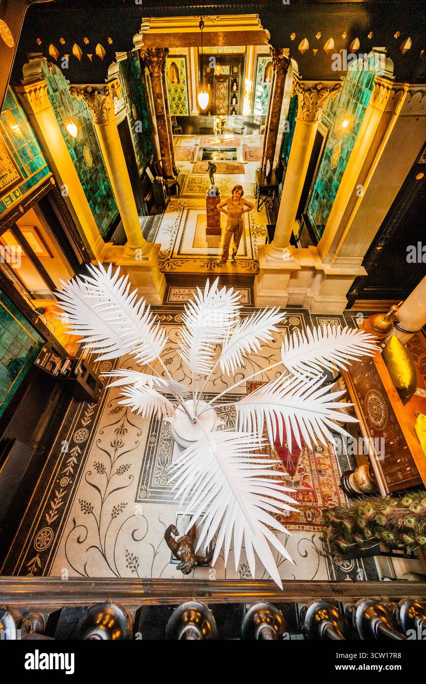 London, UK. 9th Oct, 2025. The artist with her large fern inside a ...