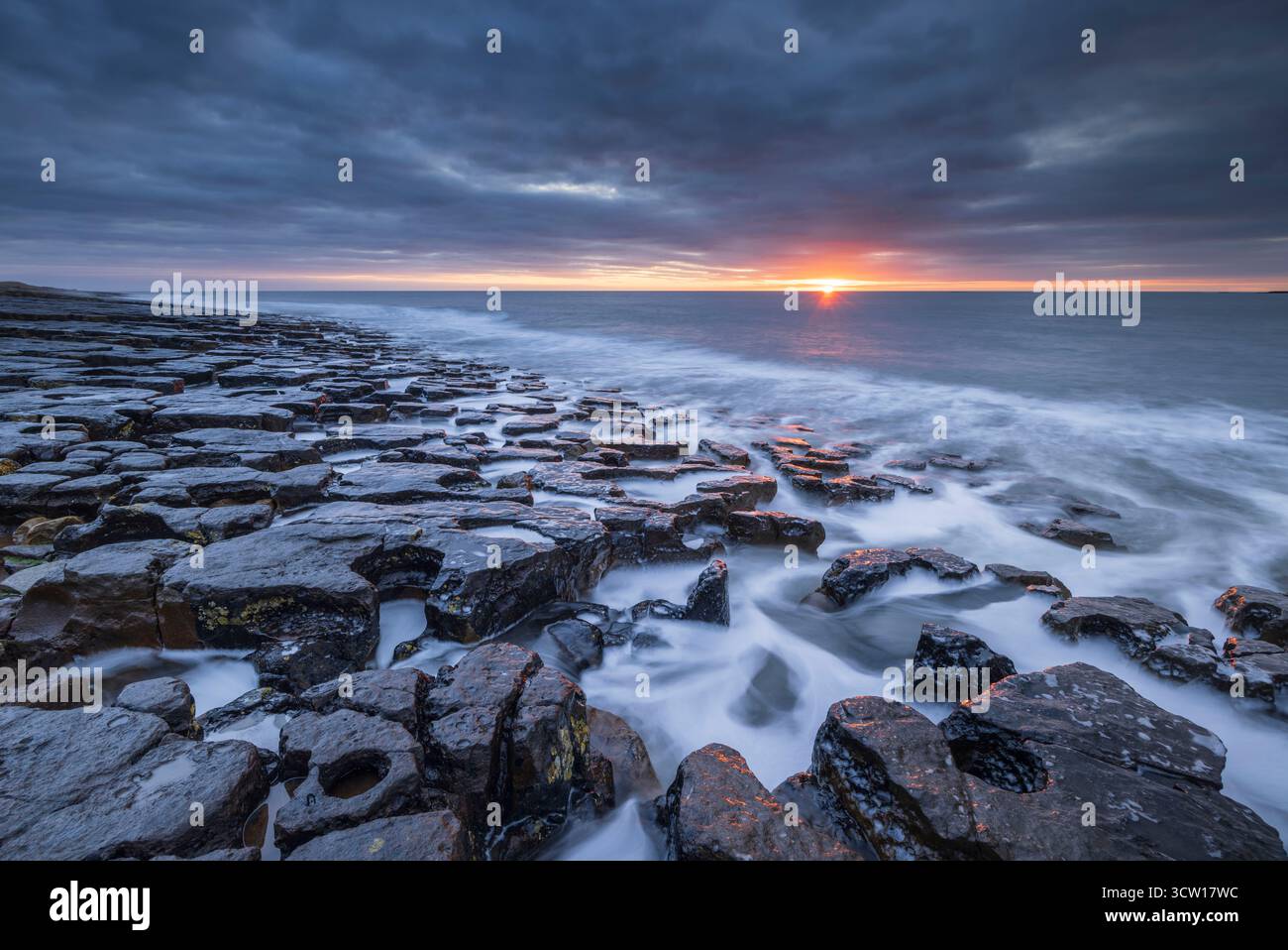 Sunrise over the ledges of Low Newton-by-the-Sea, Northumberland ...