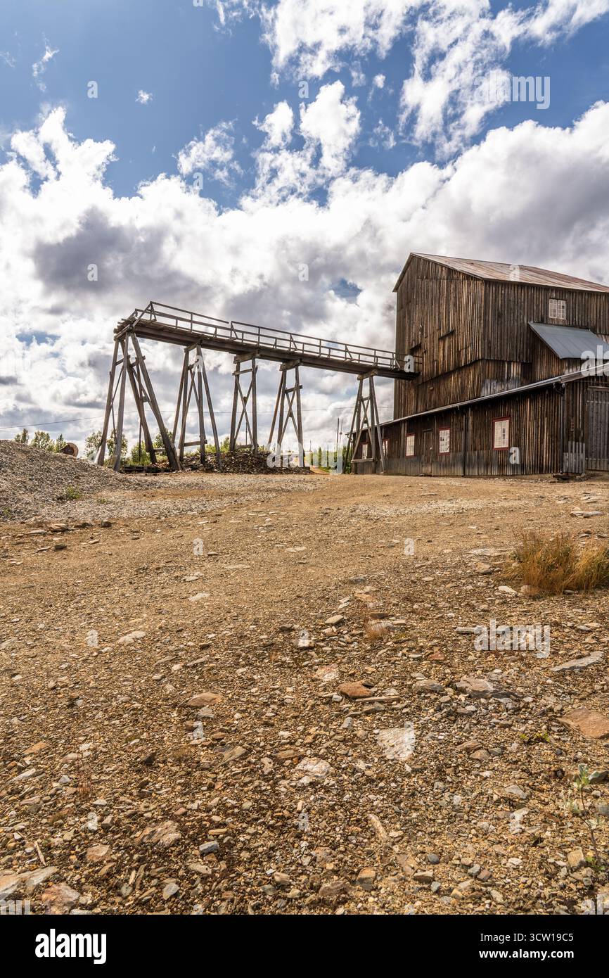 Remains of historic Olav's mine, mining shaft and generator shed stand ...