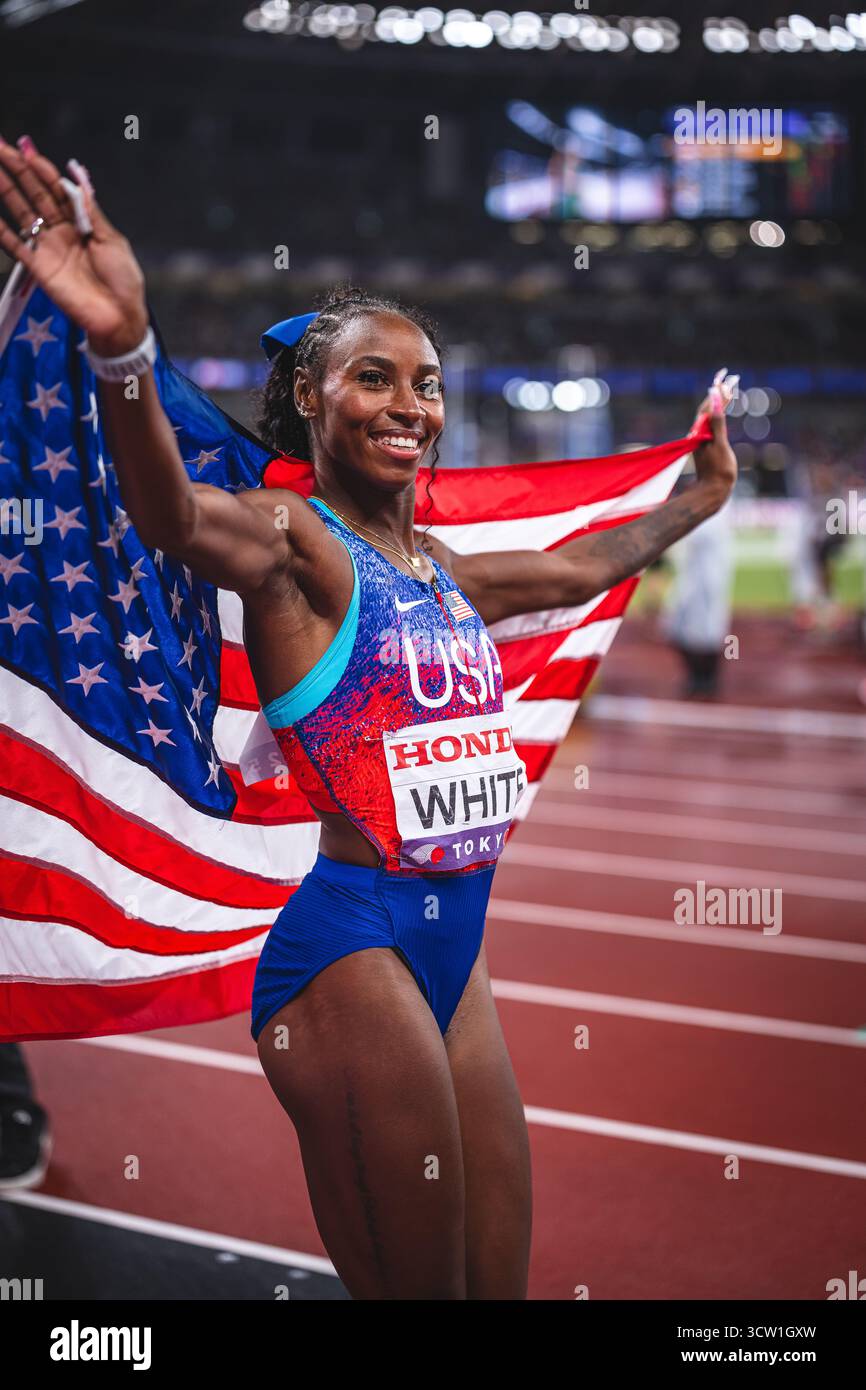 Kayla White celebrating her victory with her country's flag at the 2025 ...