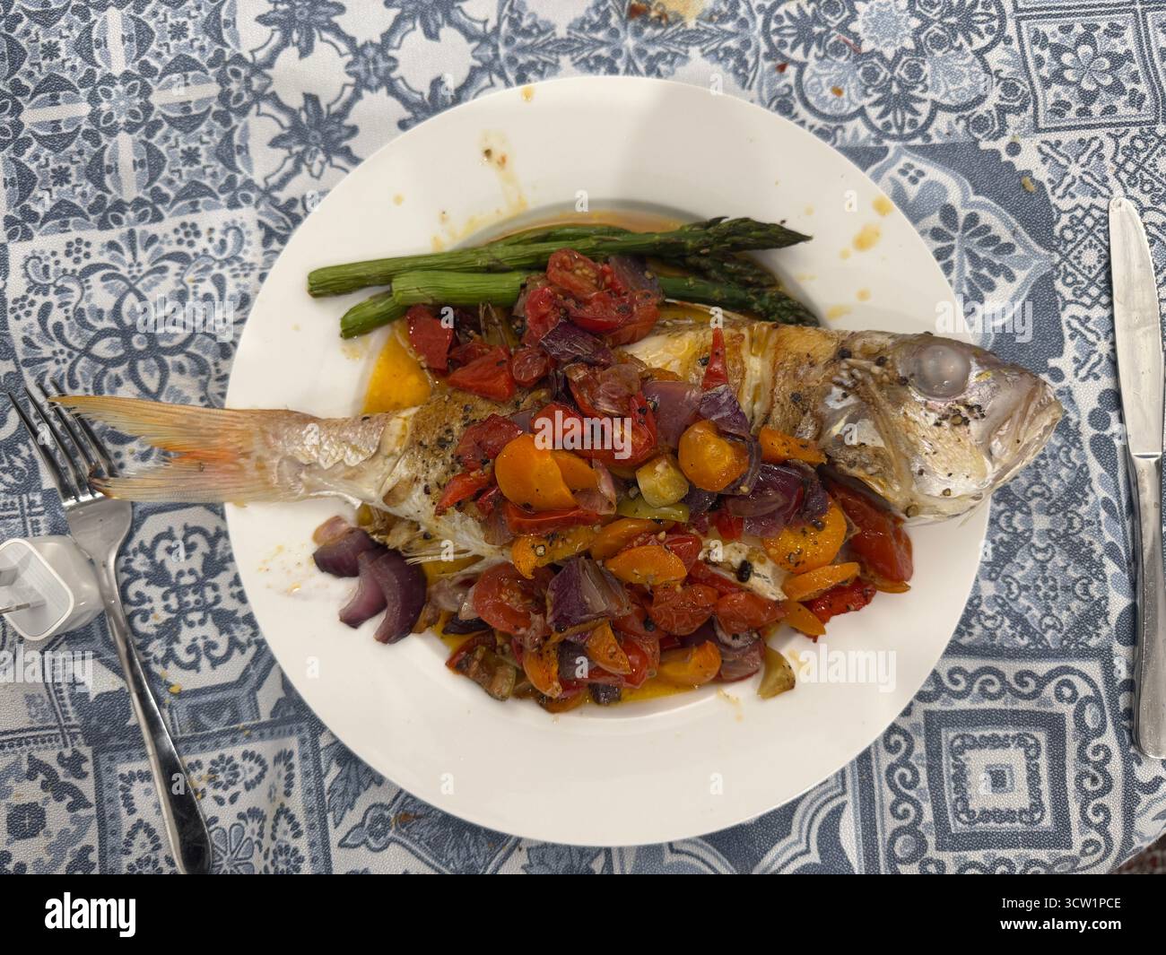 Baked gold band snapper with roasted vegetables and green asparagus ...