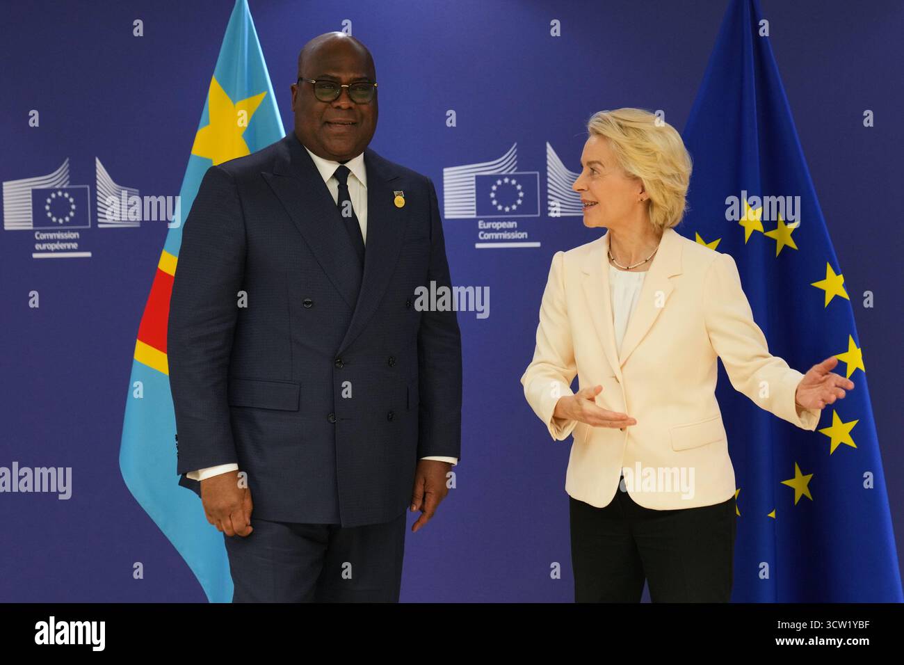European Commission President Ursula von der Leyen, right, greets ...
