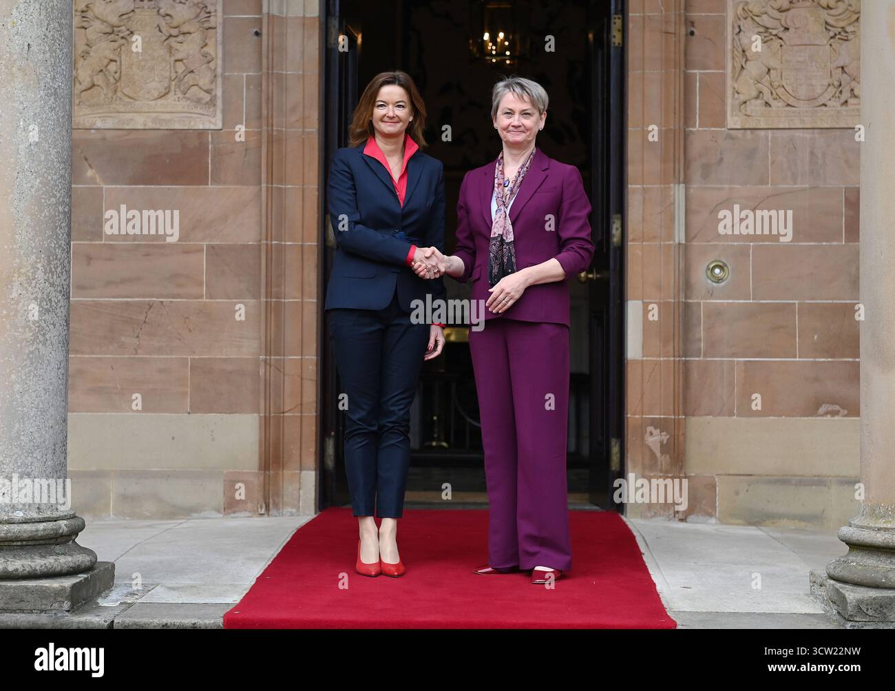 British Foreign Secretary Yvette Cooper, right, greets the Deputy Prime ...