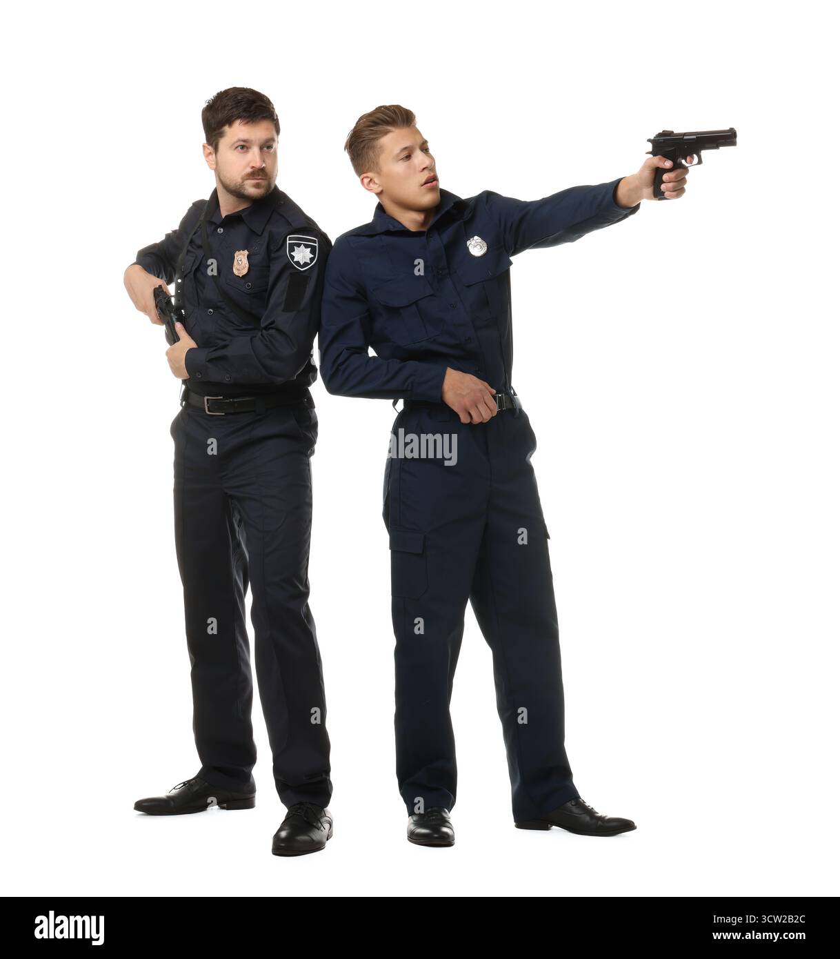 Policemen in uniform with guns on white background Stock Photo - Alamy