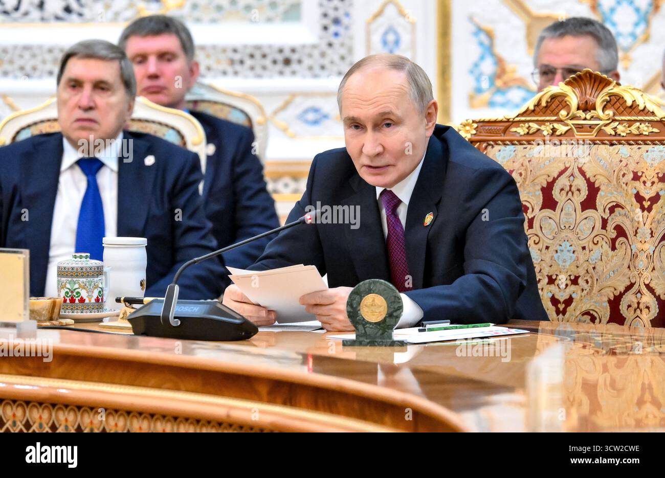 Russian President Vladimir Putin, front, speaks during the Russia ...