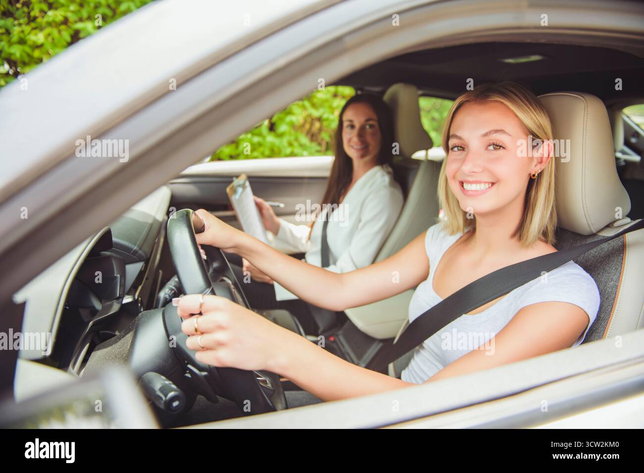 A driver courses and people concept a car driving school instructor ...