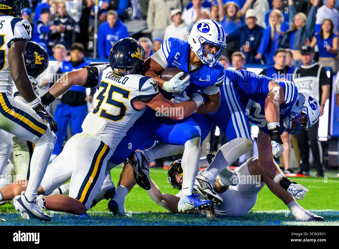BYU running back LJ Martin (4) runs the football in for a touchdown ...