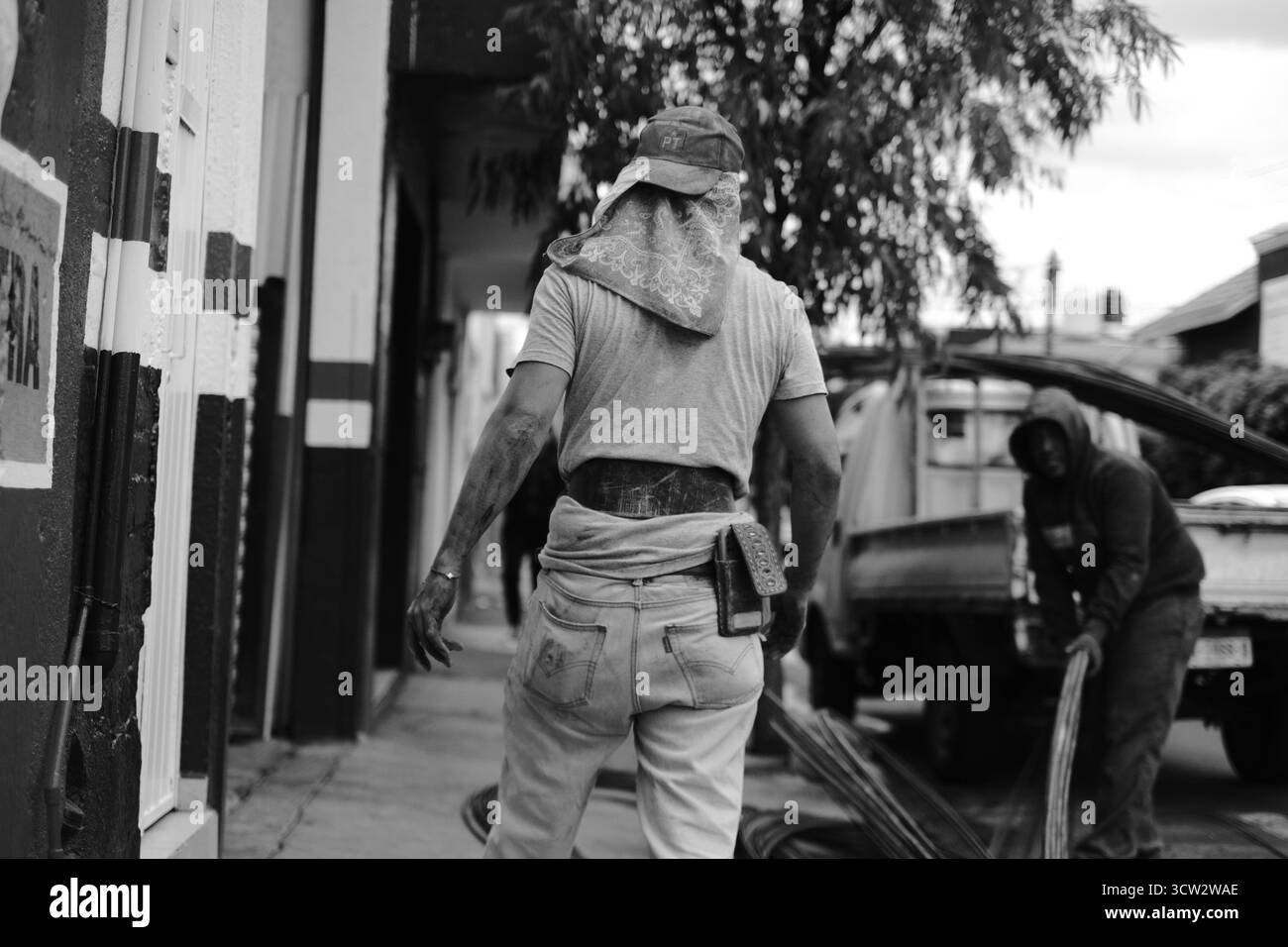 Workers in building materials Black and White Stock Photos & Images - Alamy