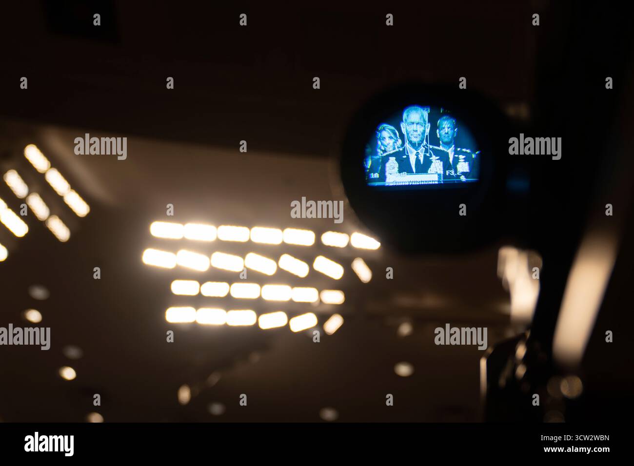 General Kenneth S. Wilsbach, USAF, is seen in a television camera ...
