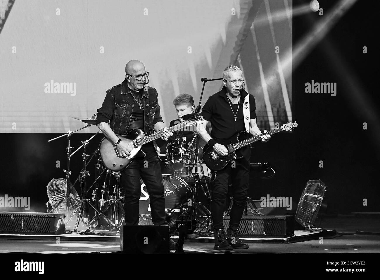 Guitarist drummer keyboardist rock Black and White Stock Photos ...