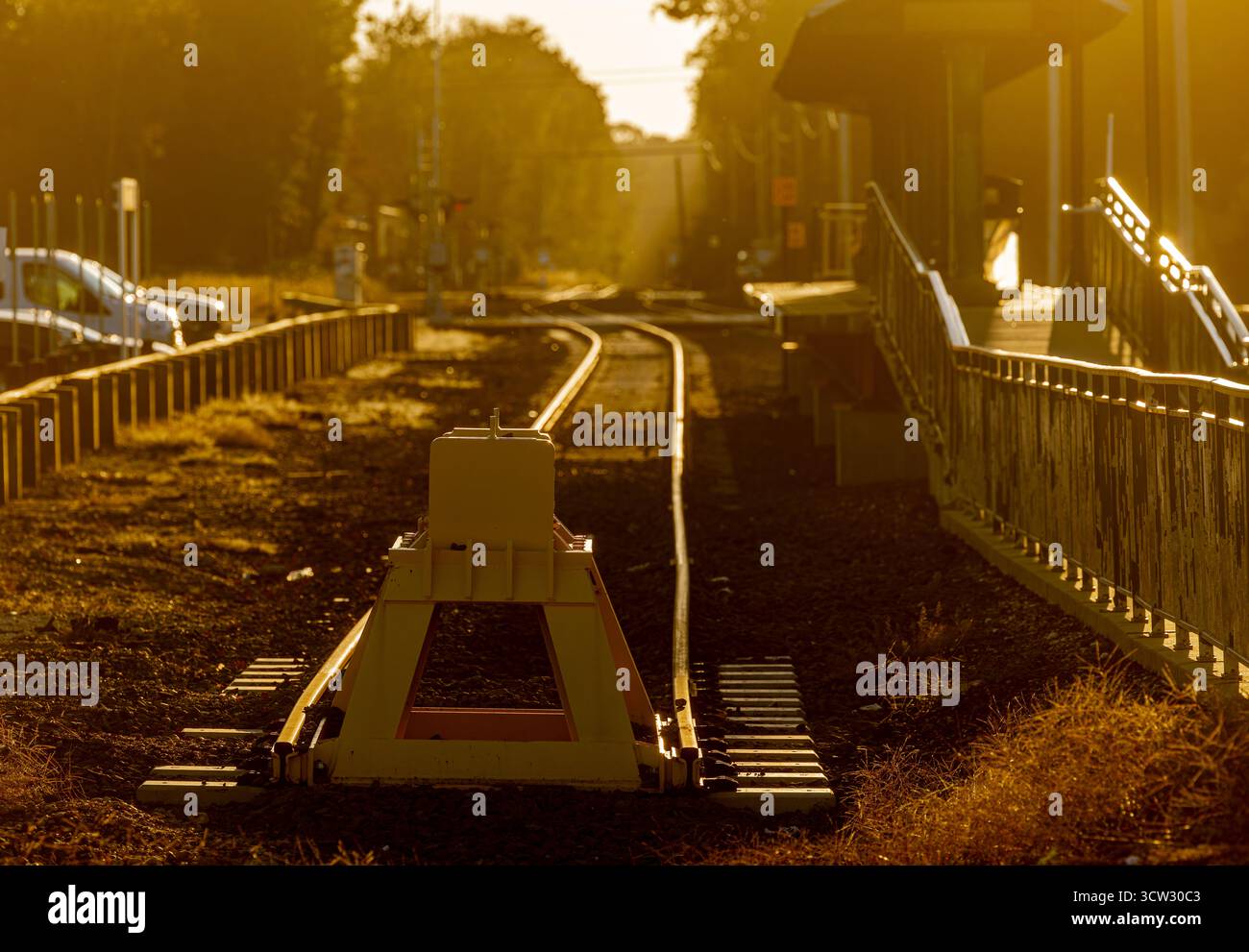 late day sun on the greenport, ny train station and lirr tracks Stock ...