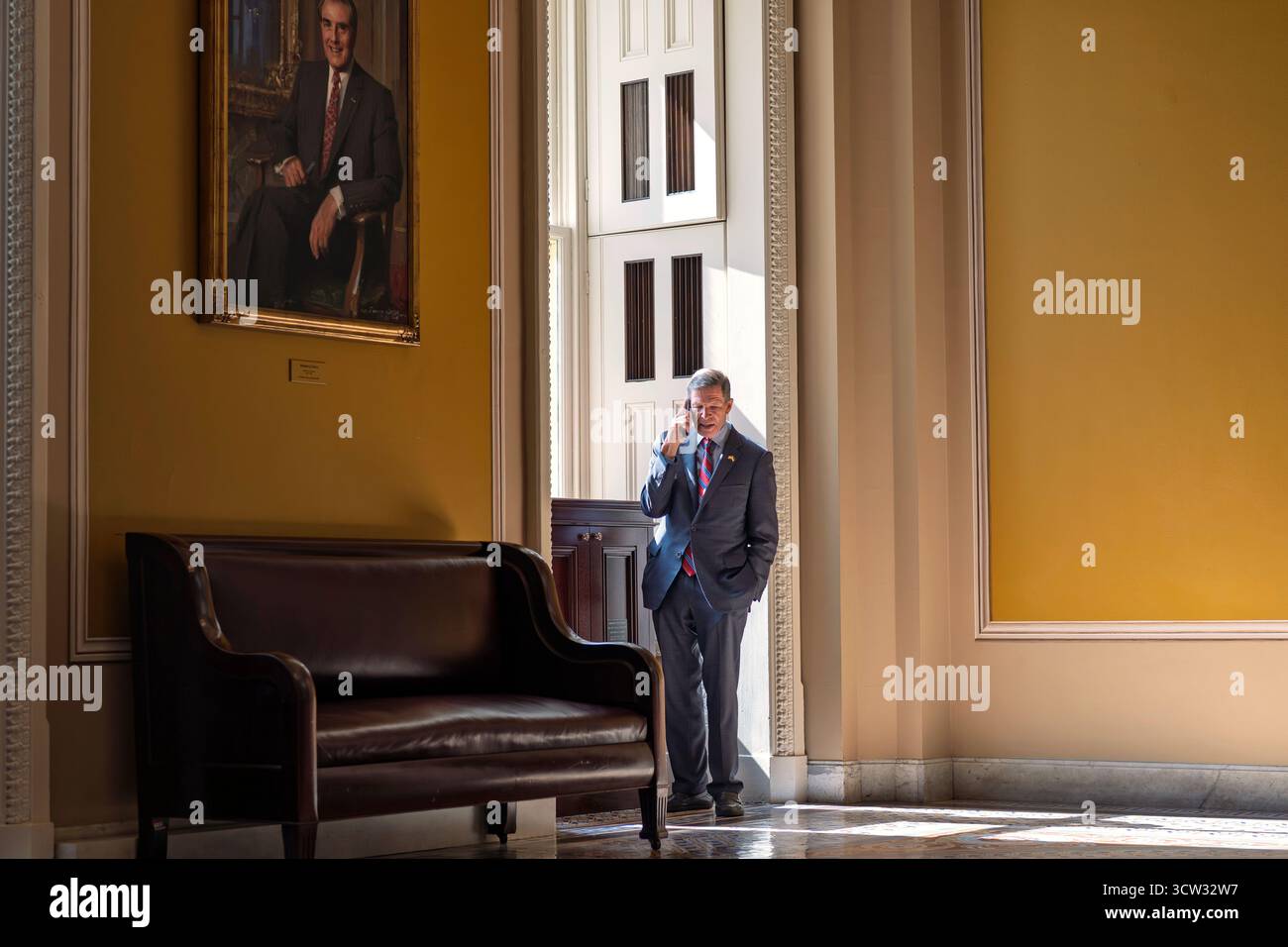 Sen. Richard Blumenthal, D-Conn., makes a phone call in a quiet space ...
