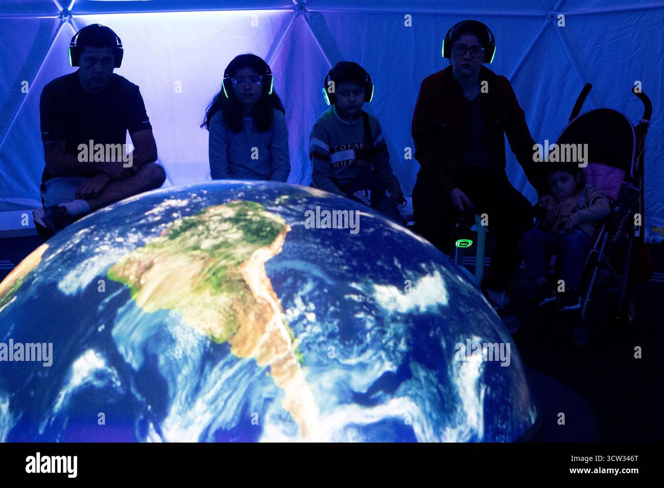 People visit an immersive, multi-sensory installation titled "The ...