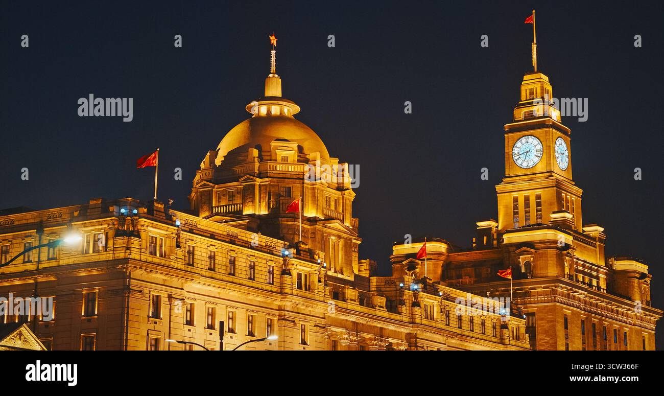 Shanghai, China. Clock tower of Shanghai, soaring beautifully at night ...