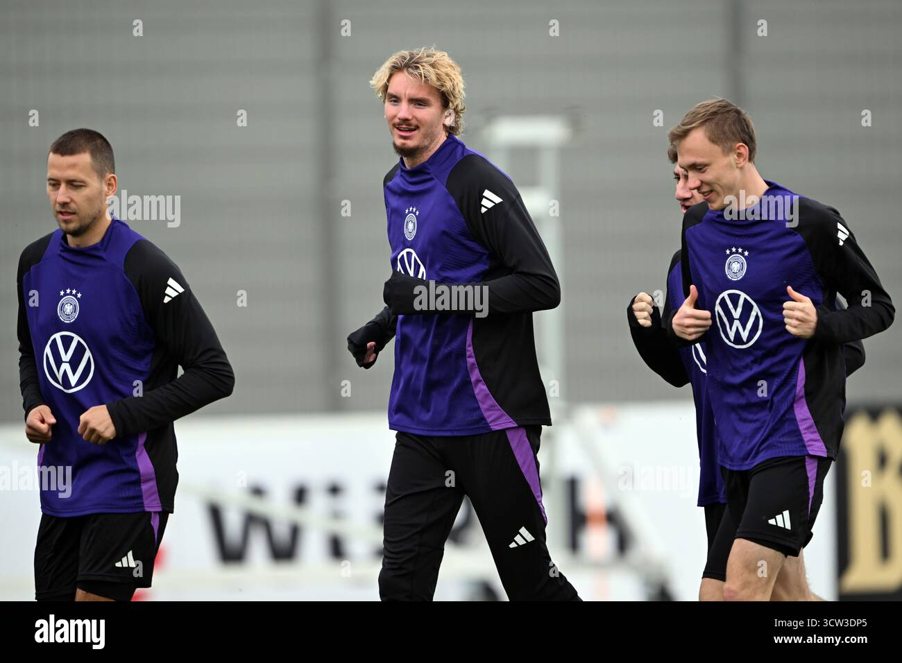 Germany's soccer players, from left, Waldemar Anton, Nick Woltemade ...