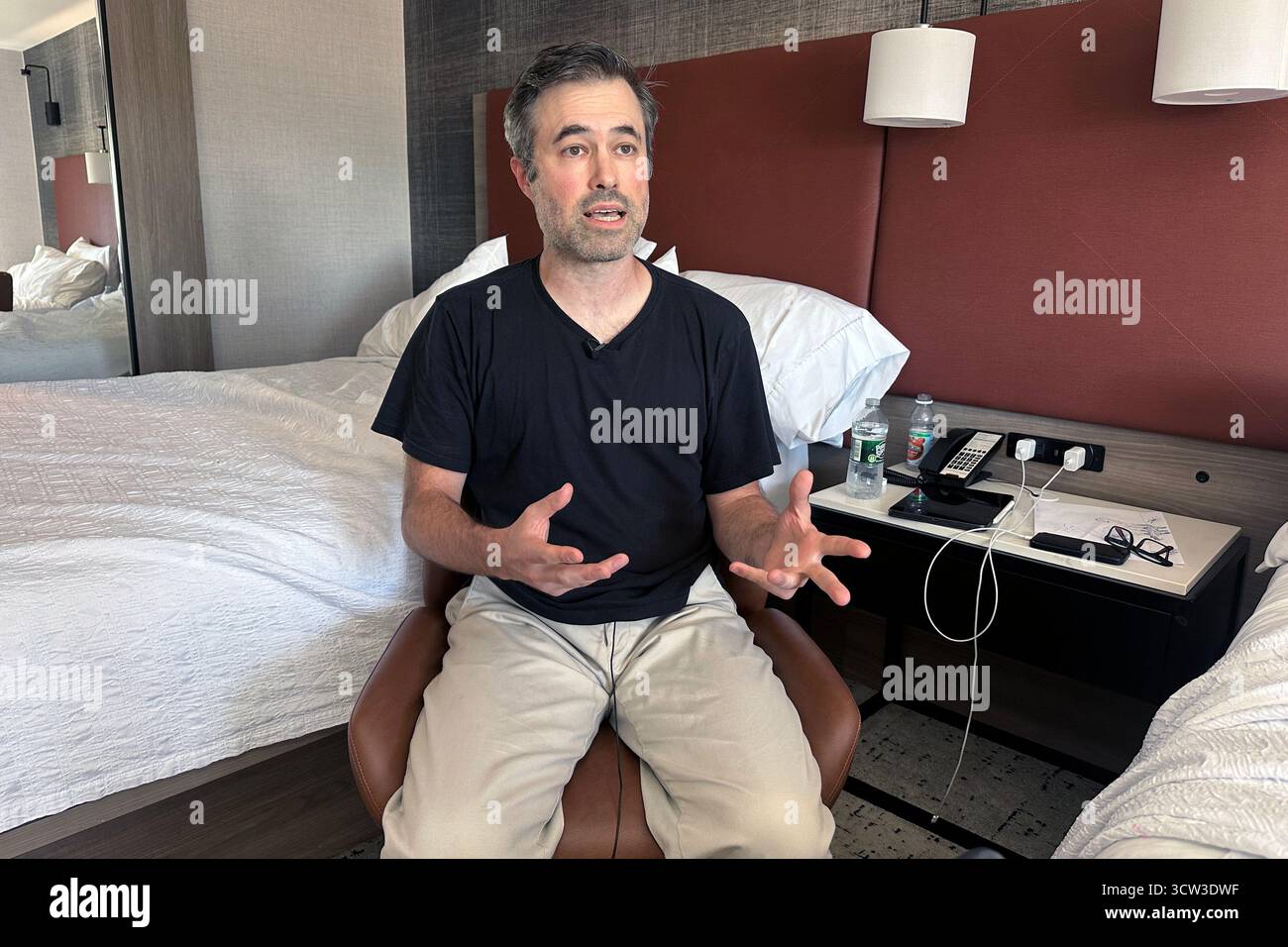Mark Bray, a Rutgers assistant professor of history, waits in a hotel ...