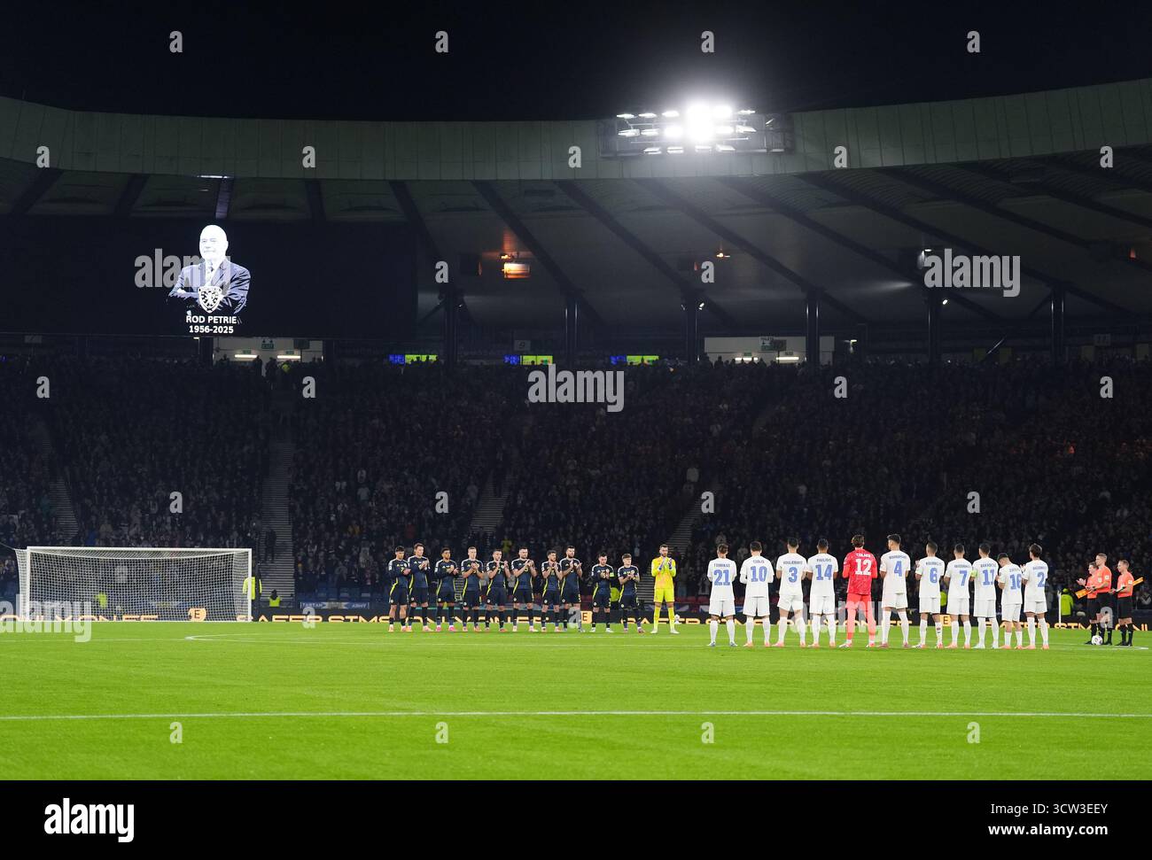 Players and fans stand for a minutes applause in memory of Rod Petrie ...