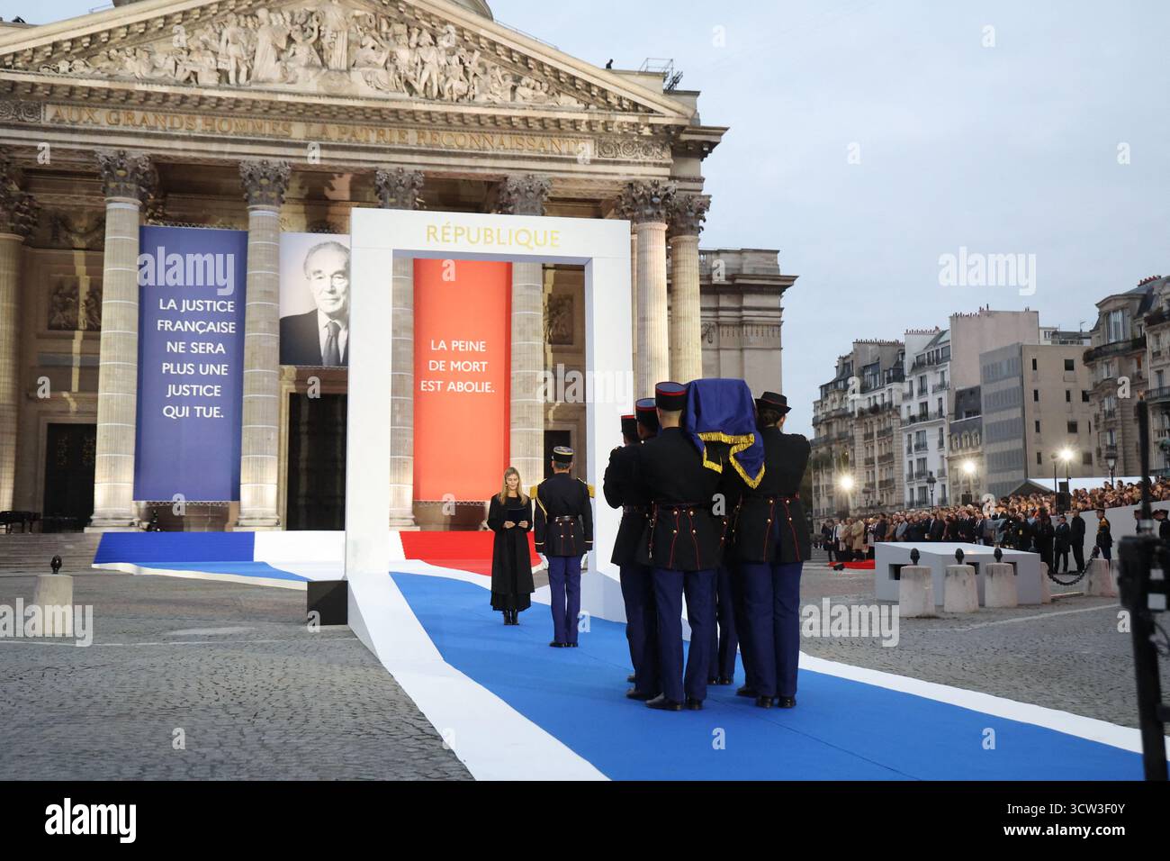 The French Republican Guard carries the ceremonial coffin draped in the ...