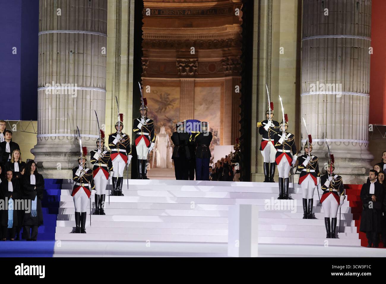 The French Republican Guard carries the ceremonial coffin draped in the ...