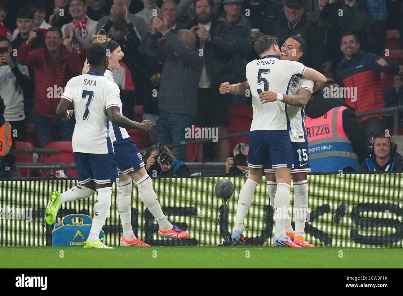 England's Morgan Rogers, right, celebrates after scoring his side's ...