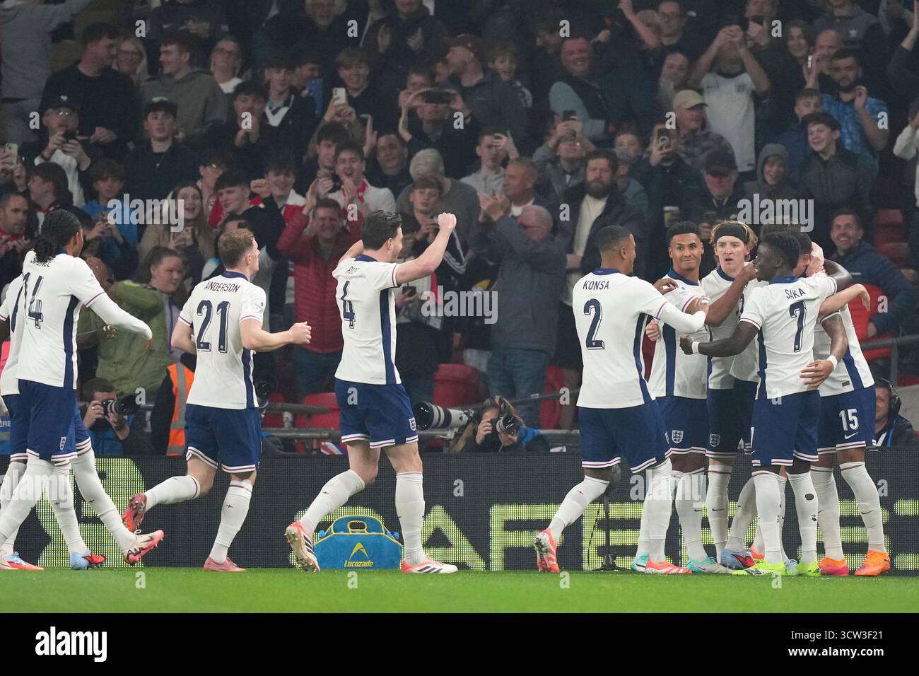England's Morgan Rogers, right, celebrates after scoring his side's ...