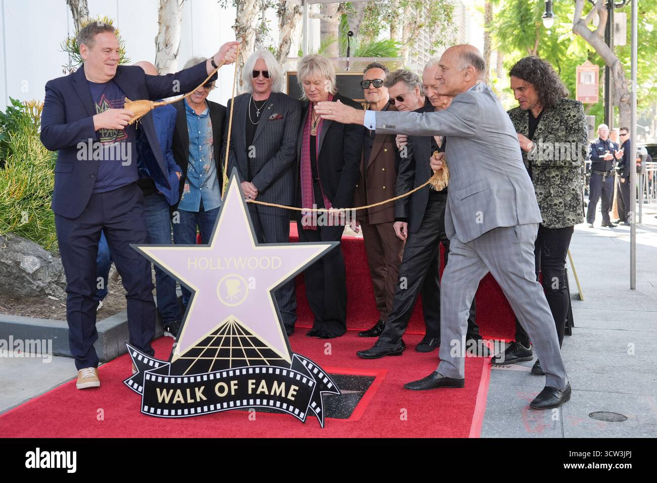Jerry Neuman, from left, Bruce Resnikoff, Jon Bon Jovi, Joe Elliott ...