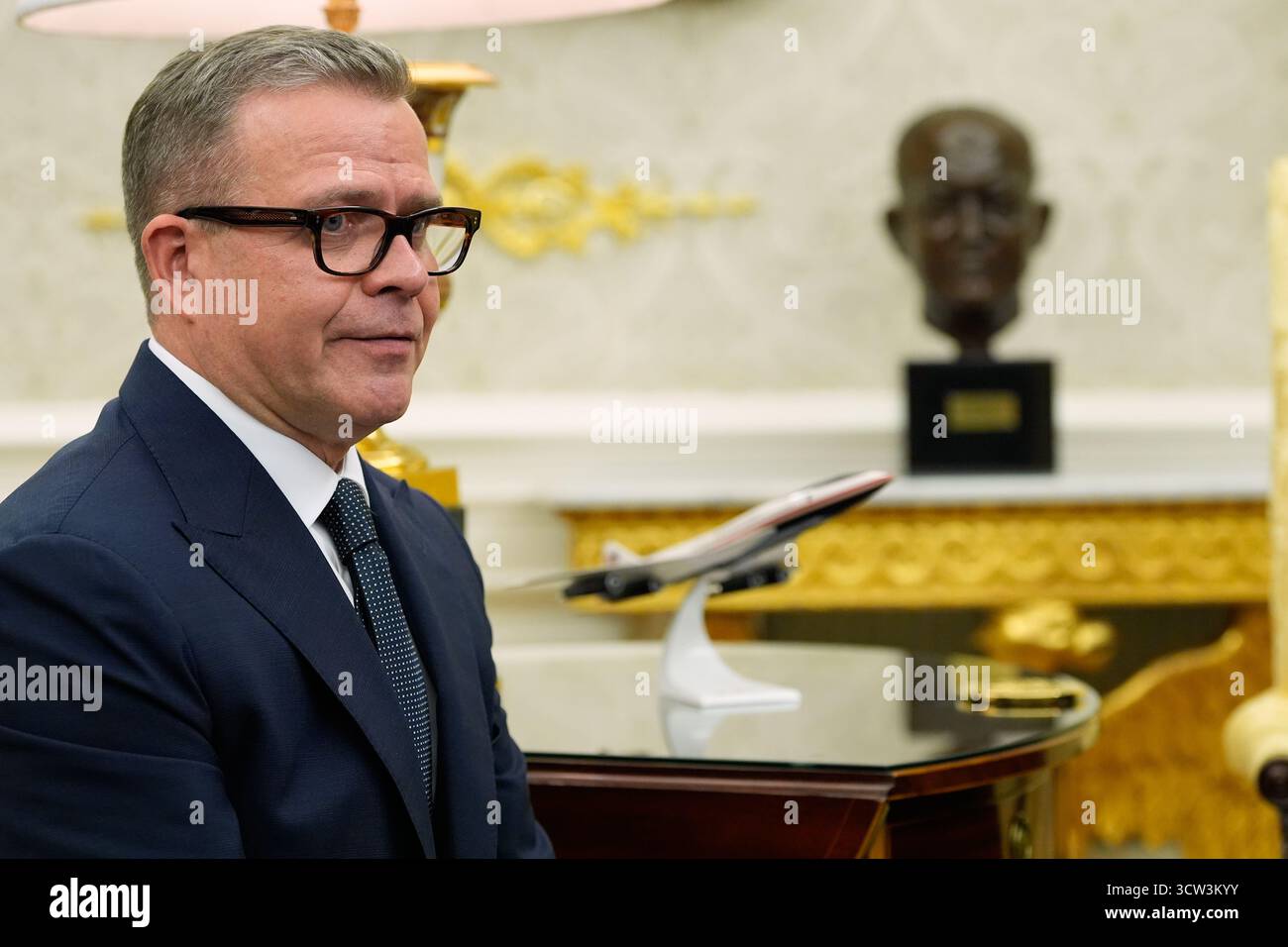 Finland's Prime Minister Petteri Orpo listens as President Donald Trump ...