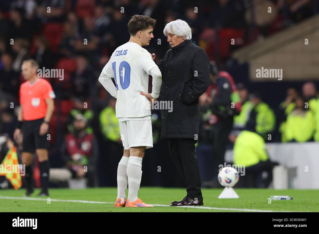 Greece's Christos Tzolis talks to Greece's head coach Ivan Jovanovic ...