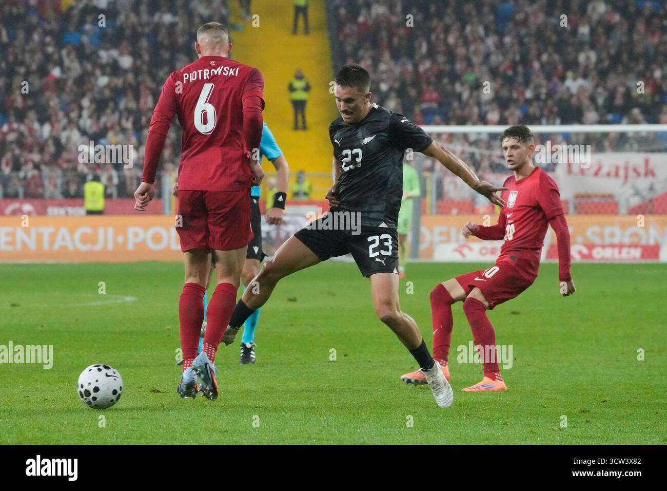 Poland's Sebastian Szymanski, right, and Jakub Piotrowski, left ...