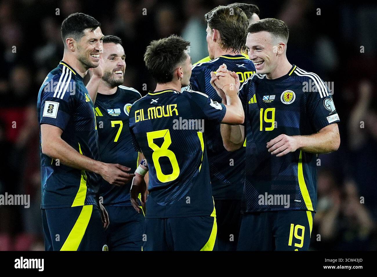 Scotland's Billy Gilmour (centre) and Lewis Ferguson (right) after the ...