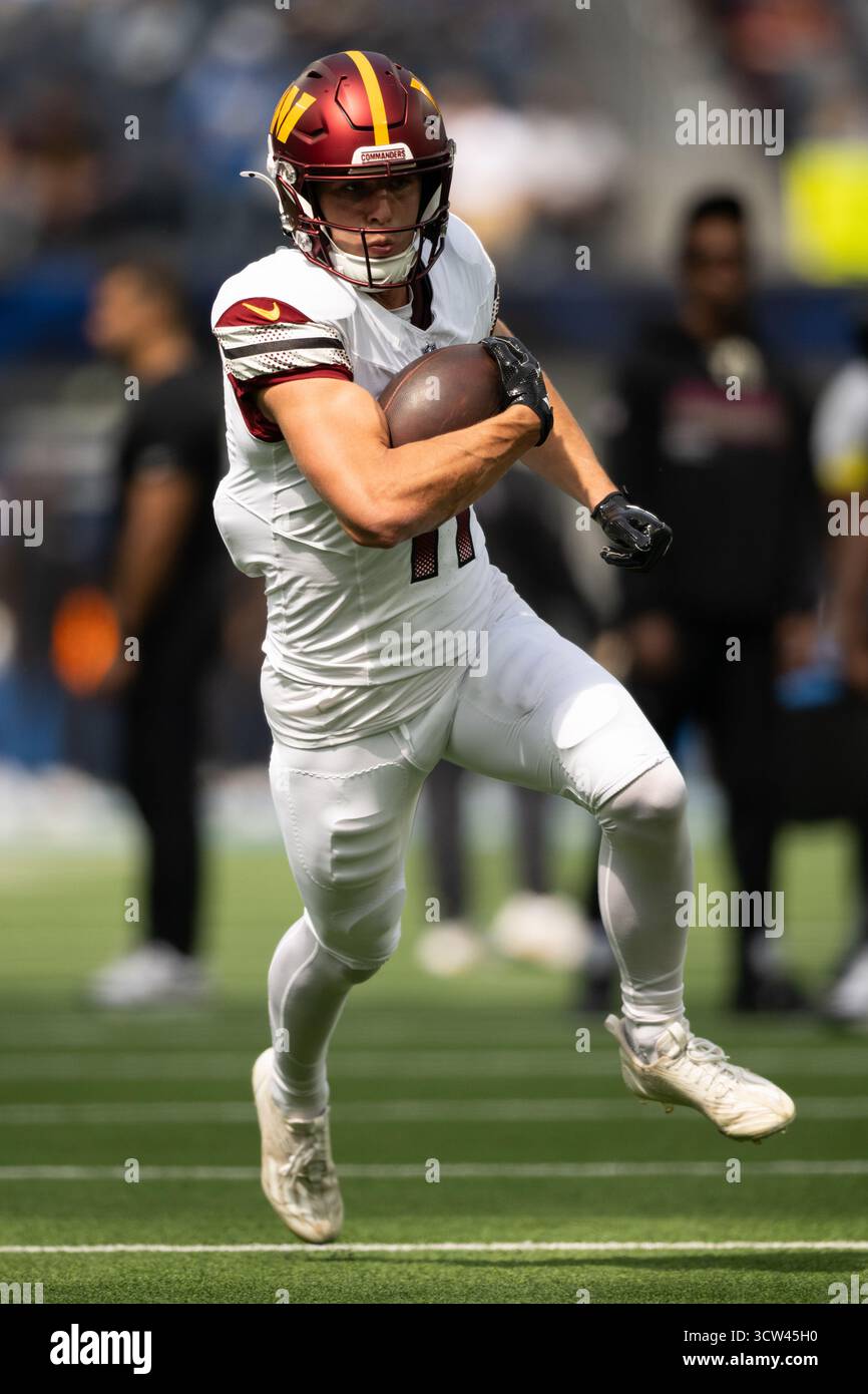 Washington Commanders wide receiver Luke McCaffrey (11) runs with the ...